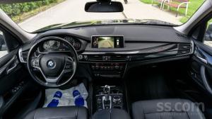 Black BMW X5 2016 in Riga, with an engine capacity of 2.00 L and mileage of 226 thousand km for 17990 €, photo 12 on AUTOMOTO.COM.LV