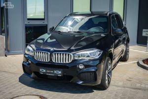 Black BMW X5 2016 in Kaunas, with an engine capacity of 3.00 L and mileage of 325 thousand km for 19950 €, photo 6 on AUTOMOTO.COM.LV