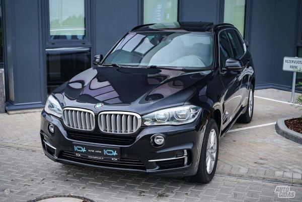 Black BMW X5 2016 in Kaunas, with an engine capacity of 3.00 L and mileage of 205 thousand km for 18950 €, photo 5 on AUTOMOTO.COM.LV