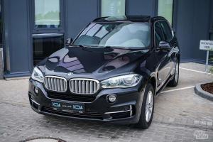 Black BMW X5 2016 in Kaunas, with an engine capacity of 3.00 L and mileage of 205 thousand km for 18950 €, photo 6 on AUTOMOTO.COM.LV