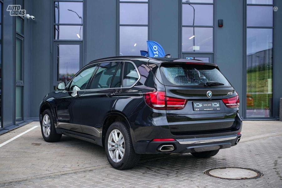 Black BMW X5 2016 in Kaunas, with an engine capacity of 3.00 L and mileage of 205 thousand km for 18950 €, photo 9 on AUTOMOTO.COM.LV