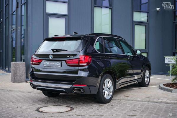 Black BMW X5 2016 in Kaunas, with an engine capacity of 3.00 L and mileage of 205 thousand km for 18950 €, photo 9 on AUTOMOTO.COM.LV