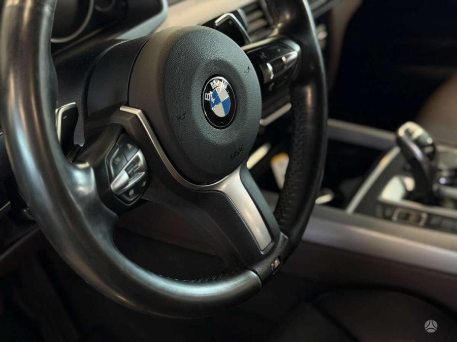 Black BMW X5 2016 in Klaipeda, with an engine capacity of 2.99 L and mileage of 310 thousand km for 20700 €, photo 8 on AUTOMOTO.COM.LV