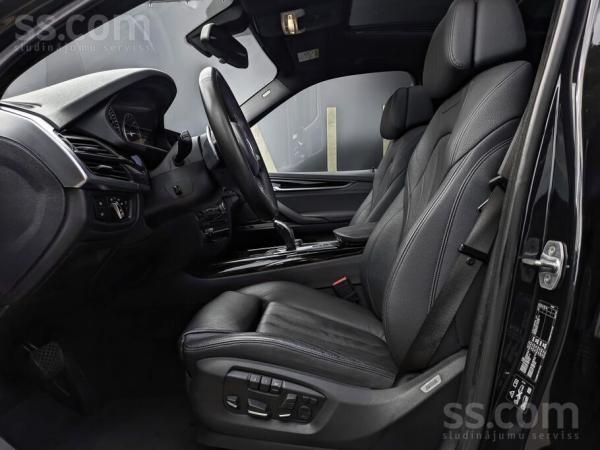 Black BMW X5 2016 in Tukums, with an engine capacity of 3.00 L and mileage of 237 thousand km for 23990 €, photo 7 on AUTOMOTO.COM.LV