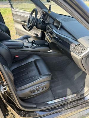 Black BMW X5 2016 in Riga, with an engine capacity of 4.40 L and mileage of 100 thousand km for 40000 €, photo 11 on AUTOMOTO.COM.LV