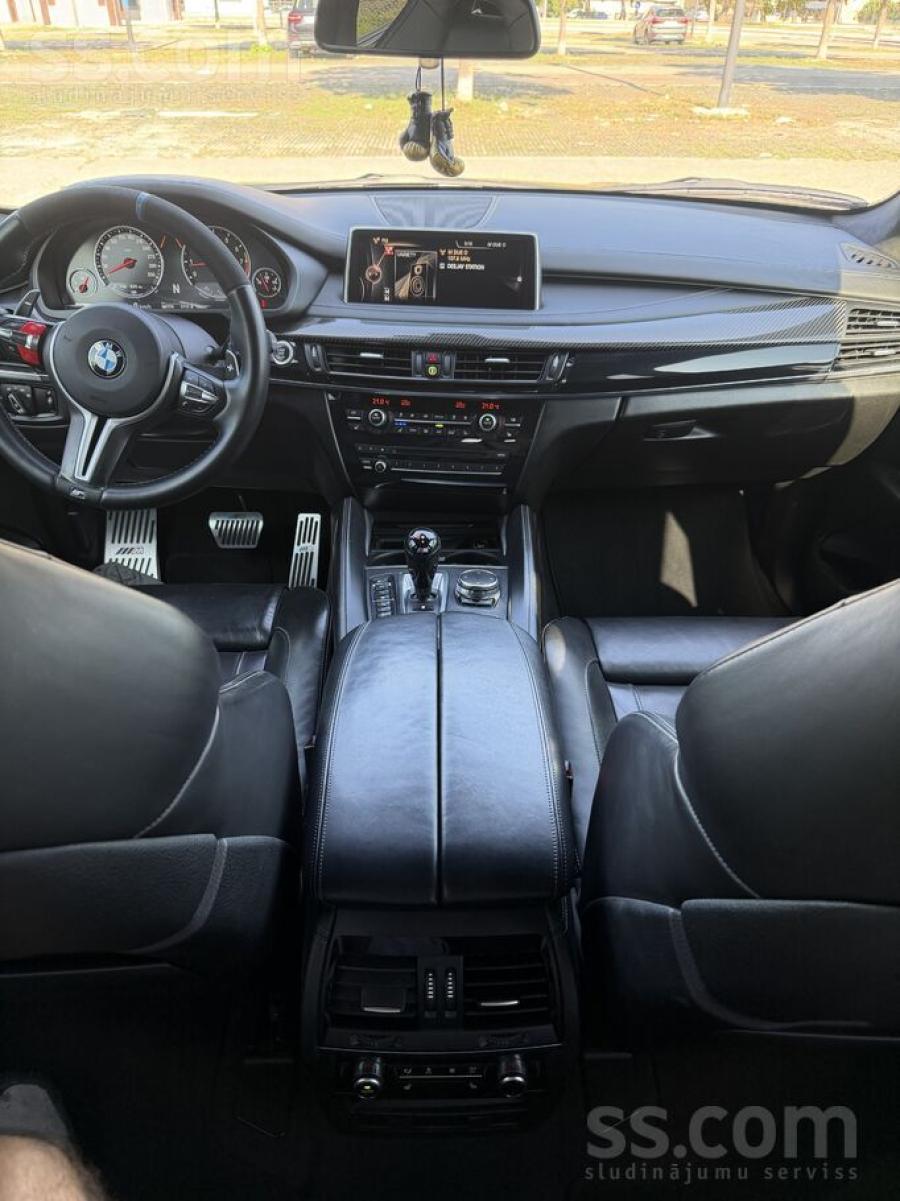 Black BMW X5 2016 in Riga, with an engine capacity of 4.40 L and mileage of 100 thousand km for 40000 €, photo 12 on AUTOMOTO.COM.LV