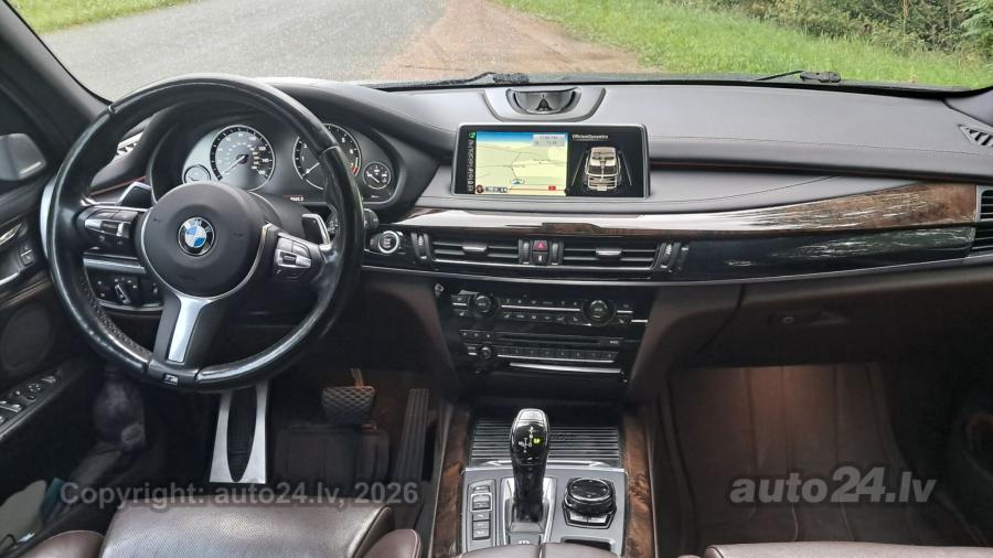 Black BMW X5 2016 in Tallinn, with an engine capacity of 4.40 L and mileage of 147 thousand km for 39900 €, photo 8 on AUTOMOTO.COM.LV