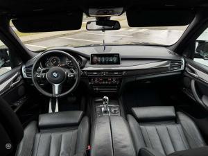 Black BMW X5 2017 in Panevezys, with an engine capacity of 2.00 L and mileage of 69 thousand km for 21000 €, photo 6 on AUTOMOTO.COM.LV