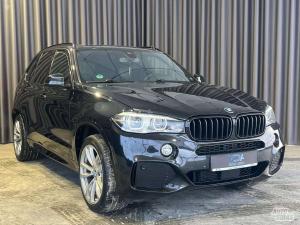 Black BMW X5 2017 in Marijampole, with an engine capacity of 3.00 L and mileage of 293 thousand km for 23950 €, photo 6 on AUTOMOTO.COM.LV
