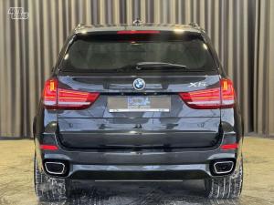 Black BMW X5 2017 in Marijampole, with an engine capacity of 3.00 L and mileage of 293 thousand km for 23950 €, photo 10 on AUTOMOTO.COM.LV