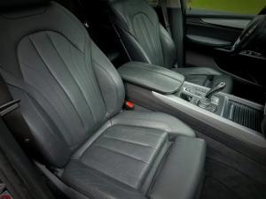 Black BMW X5 2017 in Riga, with an engine capacity of 2.00 L and mileage of 183 thousand km for 21890 €, photo 23 on AUTOMOTO.COM.LV