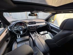Black BMW X5 2017 in Riga, with an engine capacity of 3.00 L and mileage of 177 thousand km for 28800 €, photo 12 on AUTOMOTO.COM.LV