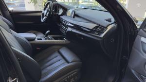 Black BMW X5 2017 in Marijampole, with an engine capacity of 2.99 L and mileage of 160 thousand km for 24999 €, photo 18 on AUTOMOTO.COM.LV