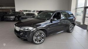 Black BMW X5 2017 in Marijampole, with an engine capacity of 2.99 L and mileage of 217 thousand km for 24999 €, photo  on AUTOMOTO.COM.LV