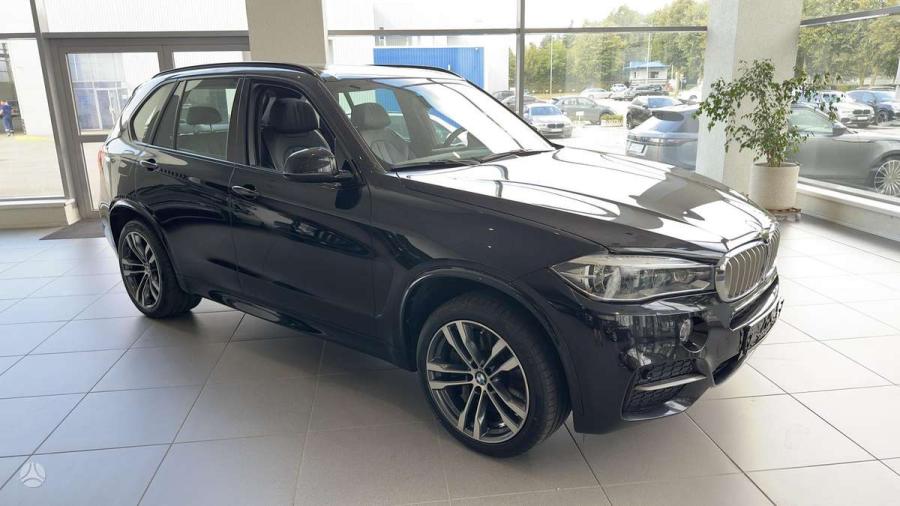 Black BMW X5 2017 in Marijampole, with an engine capacity of 2.99 L and mileage of 217 thousand km for 24999 €, photo 8 on AUTOMOTO.COM.LV