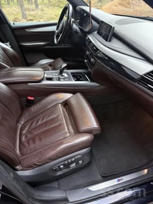 Black BMW X5 2017 in Riga, with an engine capacity of 3.00 L and mileage of 240 thousand km for 22900 €, photo 14 on AUTOMOTO.COM.LV