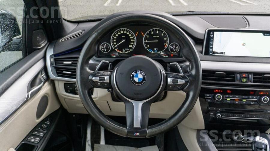 Black BMW X5 2018 in Riga, with an engine capacity of 2.00 L and mileage of 225 thousand km for 22990 €, photo 13 on AUTOMOTO.COM.LV