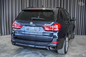 Black BMW X5 2018 in Marijampole, with an engine capacity of 3.00 L and mileage of 298 thousand km for 22950 €, photo 12 on AUTOMOTO.COM.LV