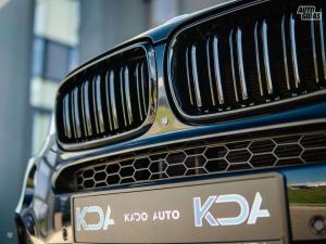 Black BMW X5 2018 in Marijampole, with an engine capacity of 3.00 L and mileage of 200 thousand km for 26450 €, photo 9 on AUTOMOTO.COM.LV