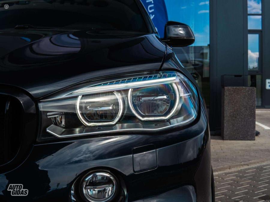 Black BMW X5 2018 in Marijampole, with an engine capacity of 3.00 L and mileage of 298 thousand km for 22750 €, photo 12 on AUTOMOTO.COM.LV