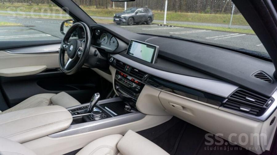 Black BMW X5 2018 in Riga, with an engine capacity of 2.00 L and mileage of 225 thousand km for 22990 €, photo 11 on AUTOMOTO.COM.LV
