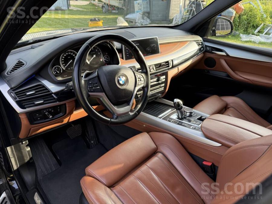 Black BMW X5 2018 in Riga, with an engine capacity of 2.00 L and mileage of 106 thousand km for 25000 €, photo 6 on AUTOMOTO.COM.LV