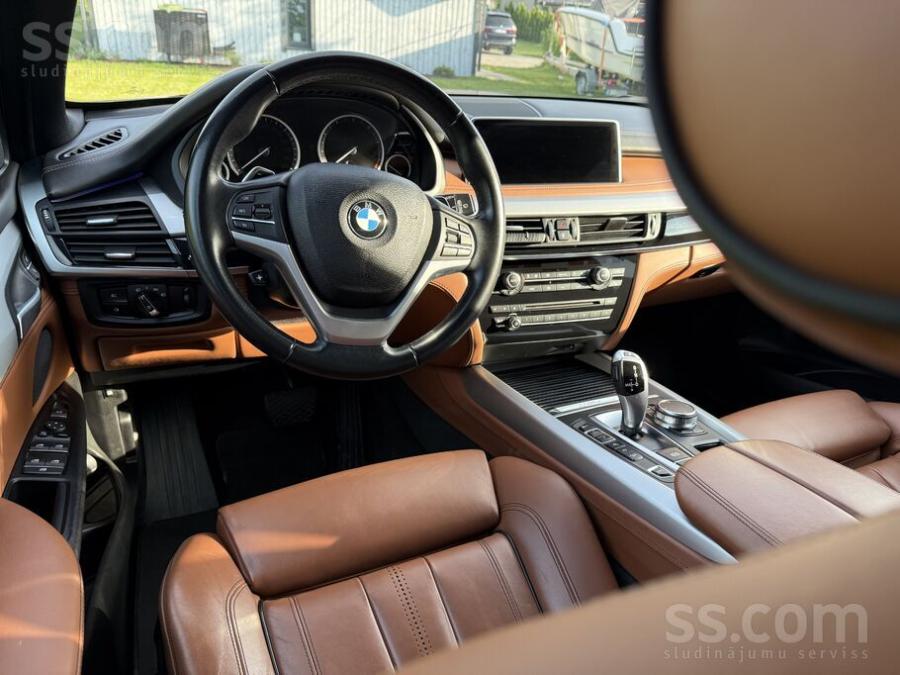 Black BMW X5 2018 in Riga, with an engine capacity of 2.00 L and mileage of 106 thousand km for 25000 €, photo 9 on AUTOMOTO.COM.LV