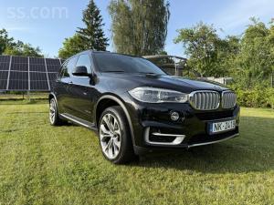 Black BMW X5 2018 in Riga, with an engine capacity of 2.00 L and mileage of 106 thousand km for 25000 €, photo 10 on AUTOMOTO.COM.LV