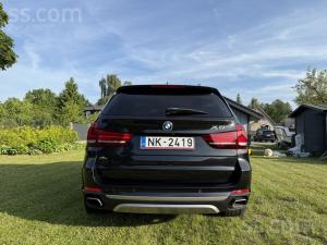 Black BMW X5 2018 in Riga, with an engine capacity of 2.00 L and mileage of 106 thousand km for 25000 €, photo 12 on AUTOMOTO.COM.LV