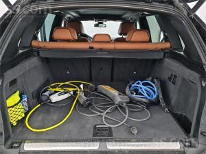 Black BMW X5 2018 in Riga, with an engine capacity of 2.00 L and mileage of 106 thousand km for 25000 €, photo 14 on AUTOMOTO.COM.LV