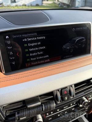 Black BMW X5 2018 in Riga, with an engine capacity of 2.00 L and mileage of 106 thousand km for 25000 €, photo 15 on AUTOMOTO.COM.LV