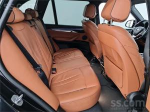 Black BMW X5 2018 in Riga, with an engine capacity of 2.00 L and mileage of 106 thousand km for 25000 €, photo 16 on AUTOMOTO.COM.LV