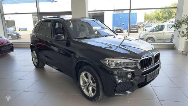 Black BMW X5 2018 in Marijampole, with an engine capacity of 2.99 L and mileage of 210 thousand km for 26999 €, photo 9 on AUTOMOTO.COM.LV