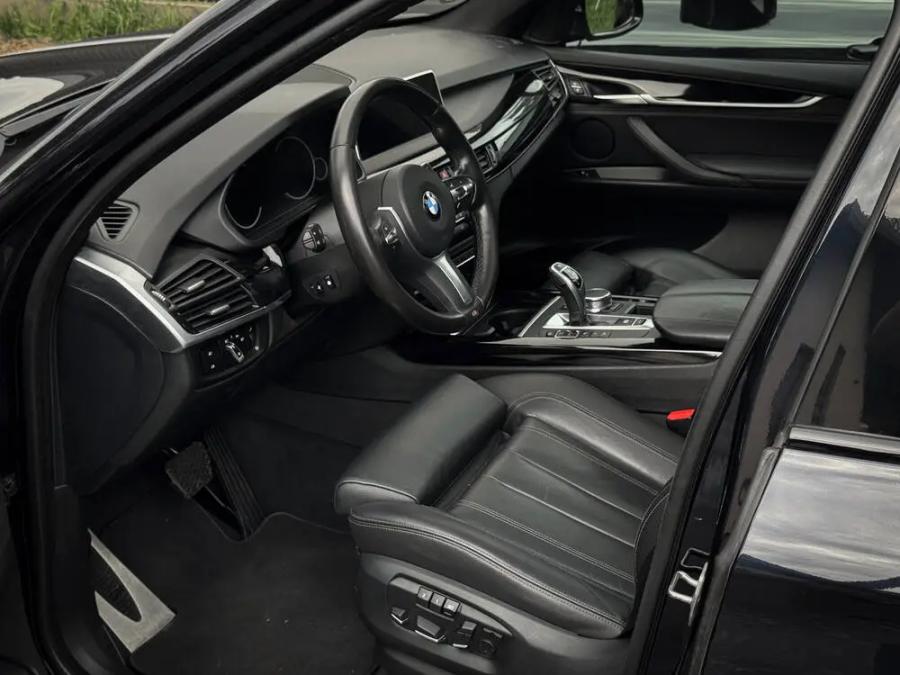 Black BMW X5 2018 in Riga, with an engine capacity of 3.00 L and mileage of 169 thousand km for 29800 €, photo 11 on AUTOMOTO.COM.LV