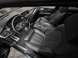 Black BMW X5 2018 in Riga, with an engine capacity of 3.00 L and mileage of 169 thousand km for 29800 €, photo 25 on AUTOMOTO.COM.LV