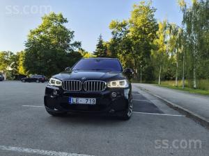Black BMW X5 2018 in Riga, with an engine capacity of 3.00 L and mileage of 172 thousand km for 26500 €, photo 5 on AUTOMOTO.COM.LV