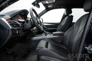 Black BMW X5 2018 in Riga, with an engine capacity of 3.00 L and mileage of 174 thousand km for 22500 €, photo 29 on AUTOMOTO.COM.LV