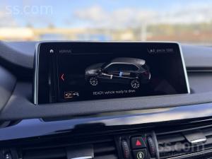 Black BMW X5 2018 in Riga, with an engine capacity of 2.00 L and mileage of 285 thousand km for 19995 €, photo 21 on AUTOMOTO.COM.LV