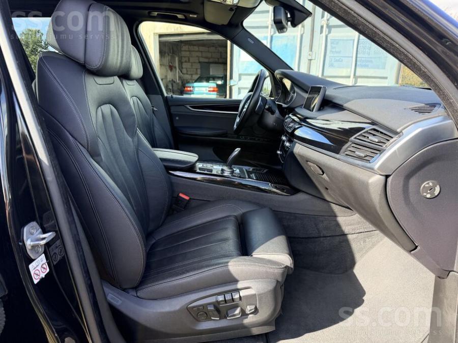 Black BMW X5 2018 in Riga, with an engine capacity of 2.00 L and mileage of 285 thousand km for 19995 €, photo 28 on AUTOMOTO.COM.LV