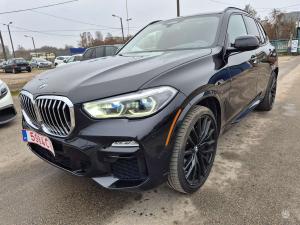 Black BMW X5 2019 in Kaunas, with an engine capacity of 4.40 L and mileage of 140 thousand km for 45980 €, photo 13 on AUTOMOTO.COM.LV