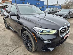 Black BMW X5 2019 in Kaunas, with an engine capacity of 4.40 L and mileage of 140 thousand km for 45980 €, photo 16 on AUTOMOTO.COM.LV