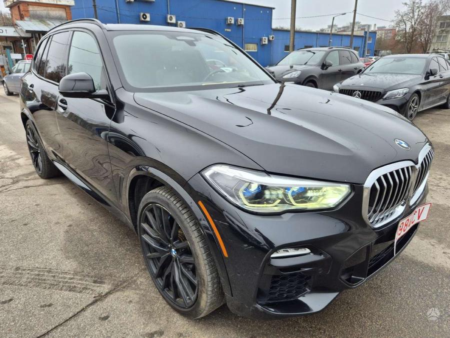 Black BMW X5 2019 in Kaunas, with an engine capacity of 4.40 L and mileage of 140 thousand km for 45980 €, photo 16 on AUTOMOTO.COM.LV