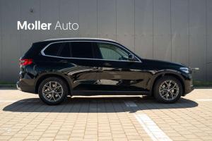 Black BMW X5 2019 in Vilnius, with an engine capacity of 3.00 L and mileage of 212 thousand km for 31200 €, photo 8 on AUTOMOTO.COM.LV