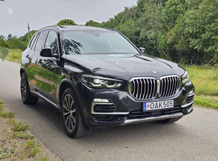 Black BMW X5 2019 in Silute, with an engine capacity of 2.99 L and mileage of 317 thousand km for 29500 €, photo 6 on AUTOMOTO.COM.LV