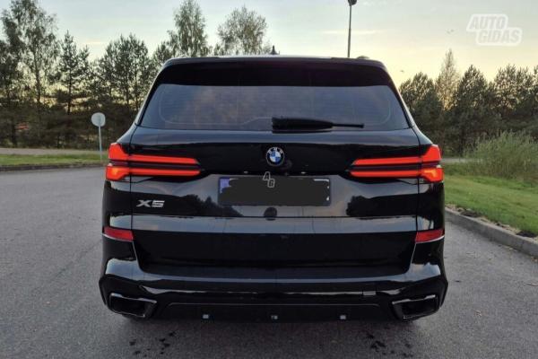 BMW X5 2019 in Silute on AUTOMOTO.COM.LV Black BMW X5 2019 in Silute, with an engine capacity of 3.00 L and mileage of 310 thousand km for 32900 €, photo 5 on AUTOMOTO.COM.LV