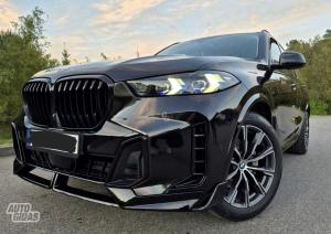Black BMW X5 2019 in Silute, with an engine capacity of 3.00 L and mileage of 310 thousand km for 32900 €, photo 10 on AUTOMOTO.COM.LV
