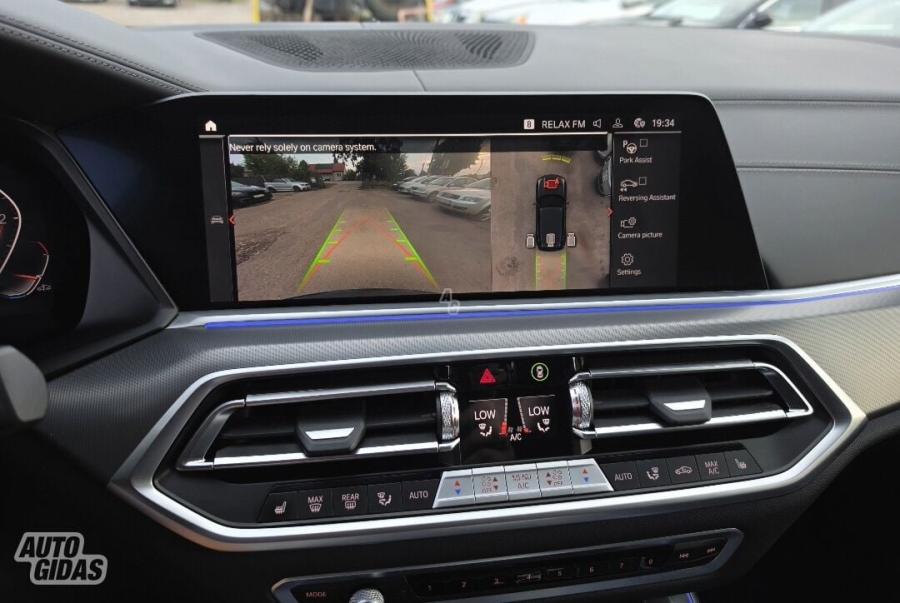 Black BMW X5 2019 in Silute, with an engine capacity of 3.00 L and mileage of 310 thousand km for 32900 €, photo 16 on AUTOMOTO.COM.LV