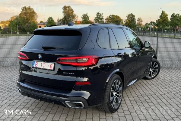 Black BMW X5 2020 in Jelgava, with an engine capacity of 3.00 L and mileage of 0 thousand km for 6450 €, photo 4 on AUTOMOTO.COM.LV