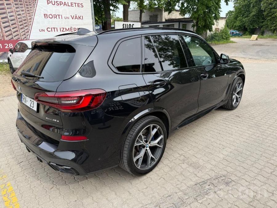 Black BMW X5 2020 in Riga, with an engine capacity of 3.00 L and mileage of 185 thousand km for 46000 €, photo 4 on AUTOMOTO.COM.LV
