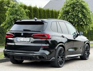 Black BMW X5 2020 in Riga, with an engine capacity of 4.40 L and mileage of 149 thousand km for 49500 €, photo 8 on AUTOMOTO.COM.LV